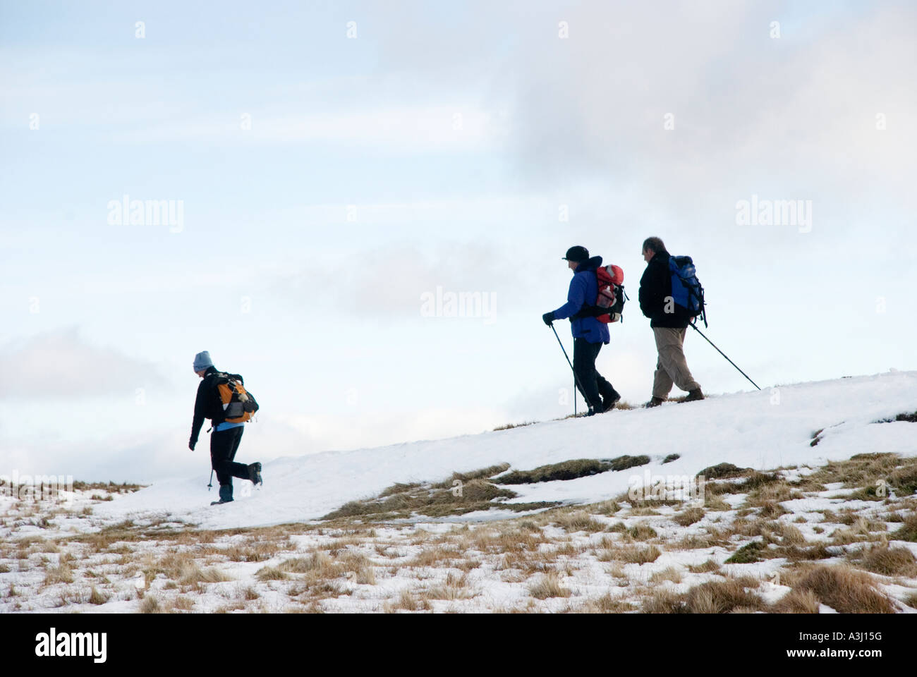 Walkers descend Red Screes in the Lake District Stock Photo - Alamy