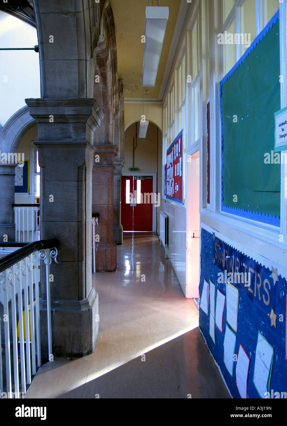 View along corridor of old school building Stock Photo - Alamy