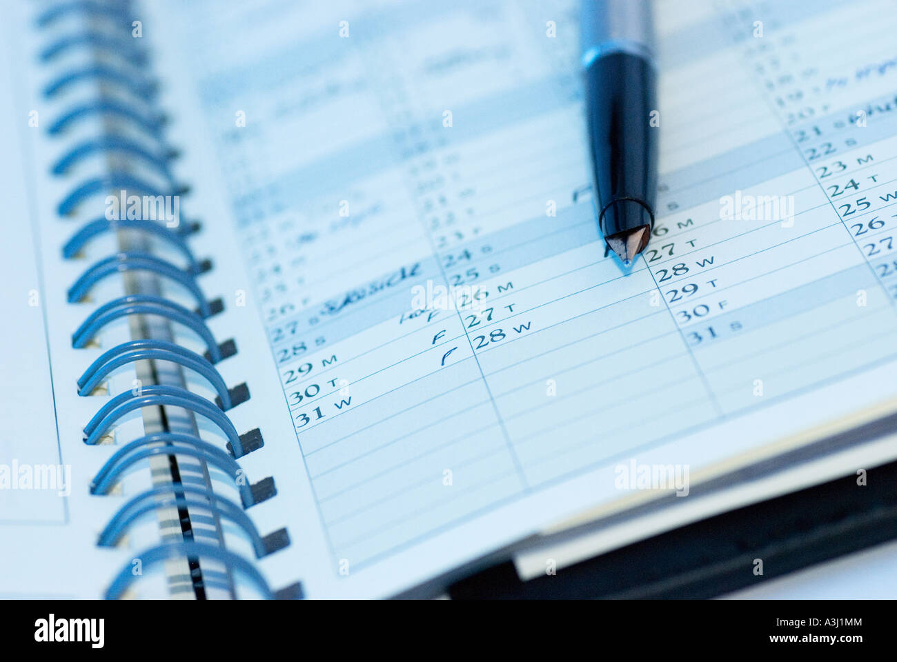 Pen in diary Stock Photo - Alamy