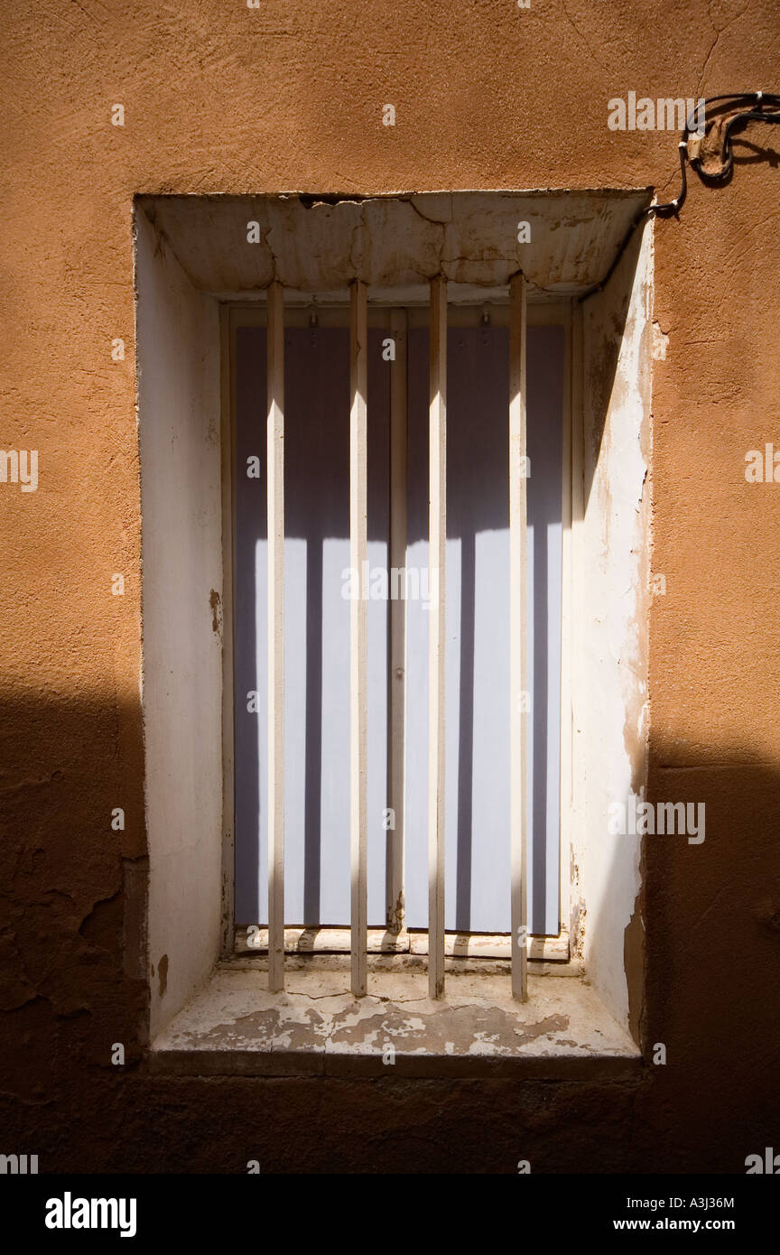 Barred window in Rousillon, Vaucluse, Provence, France Stock Photo - Alamy