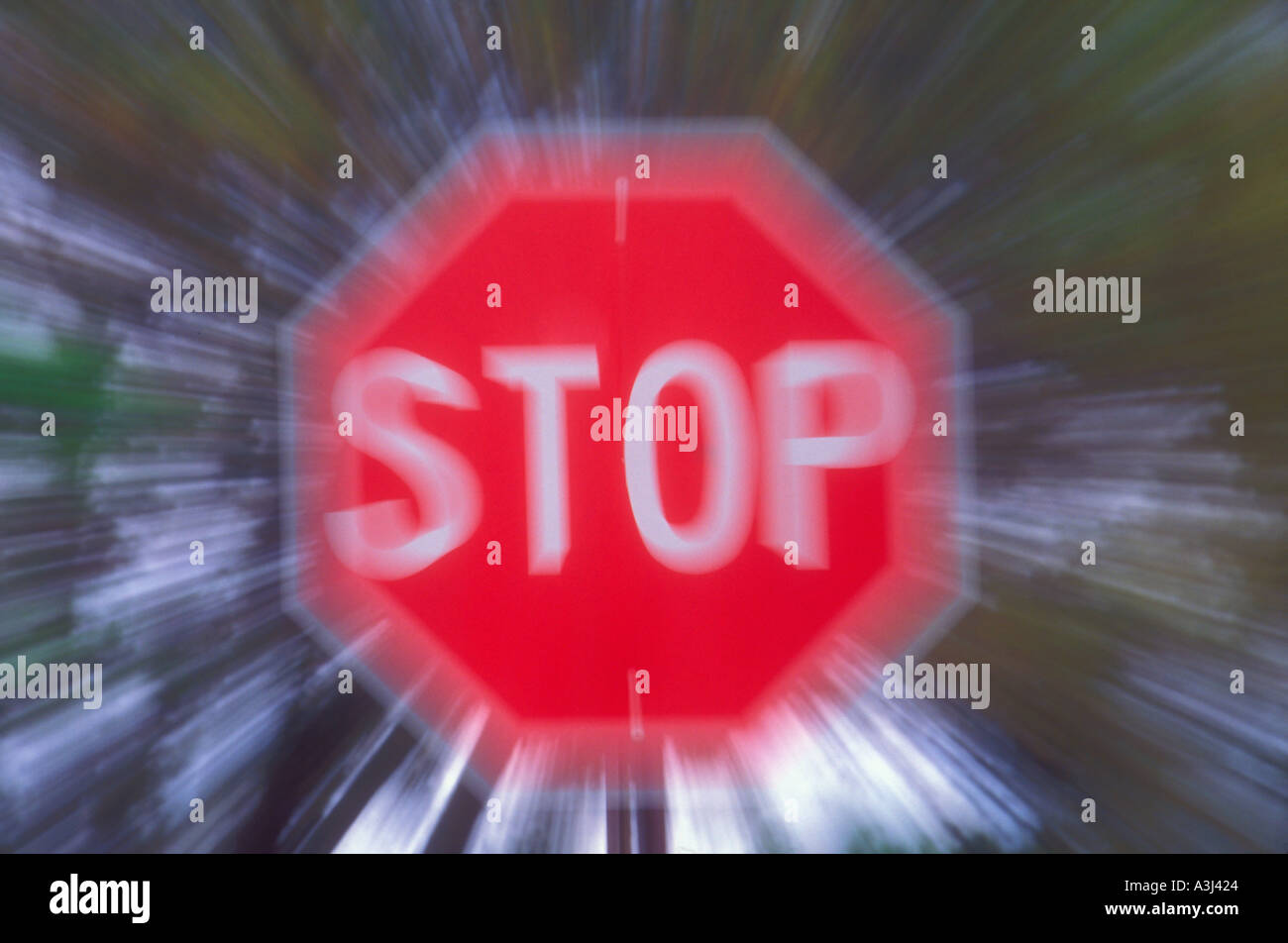 zoomed stop sign at night on lonely road Stock Photo - Alamy