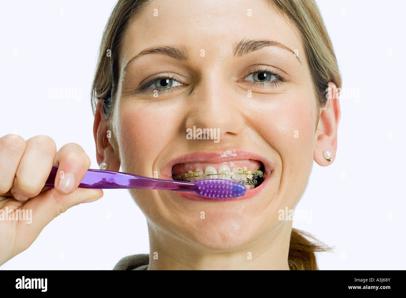 Woman brushing teeth Stock Photo - Alamy