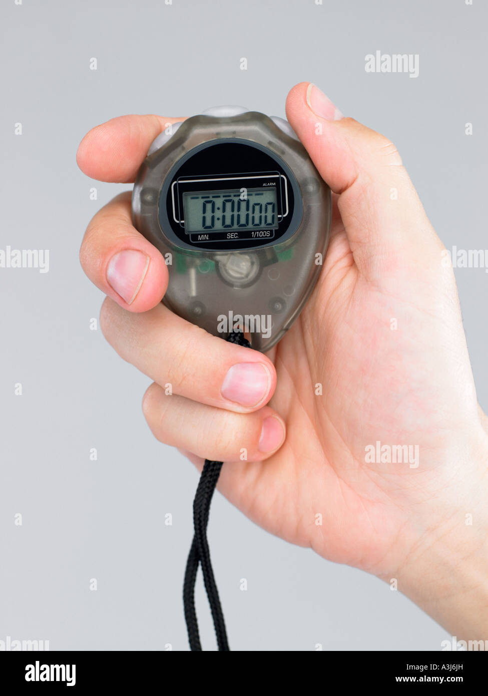 Male hand holding stop watch hi-res stock photography and images - Alamy