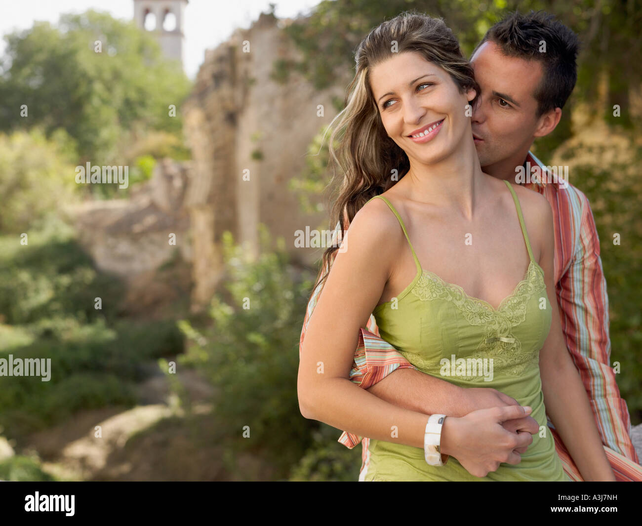 Man kissing woman on neck Stock Photo - Alamy
