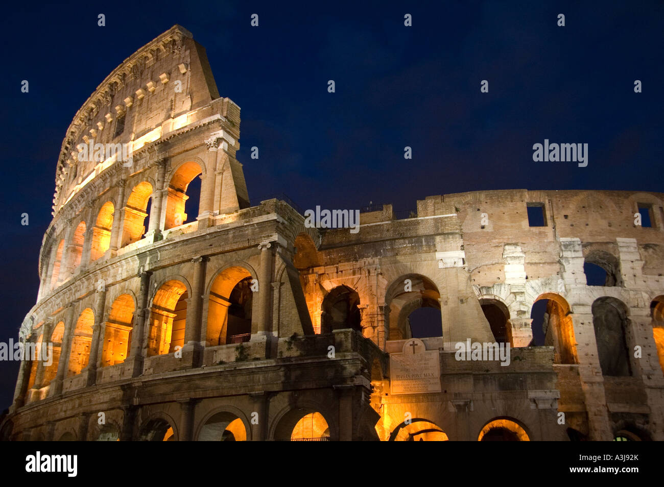 The exterior of the Colosseum, showing the partially intact outer wall ...