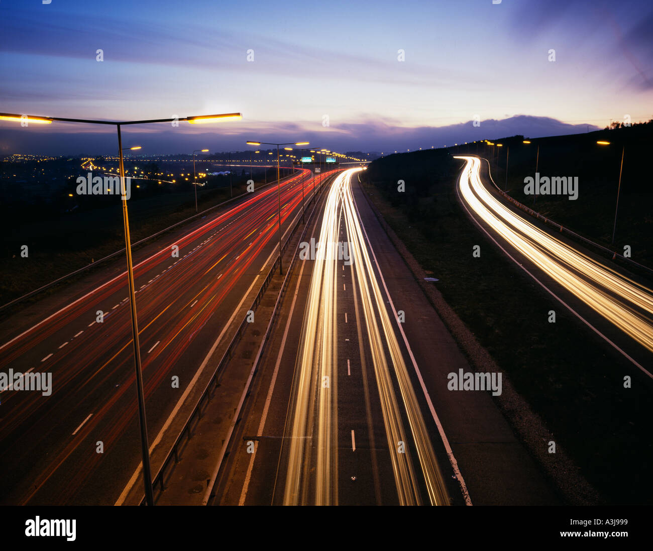 MOTORWAY AT NIGHT WITH STREAKED HEADLIGHTS UK Stock Photo - Alamy