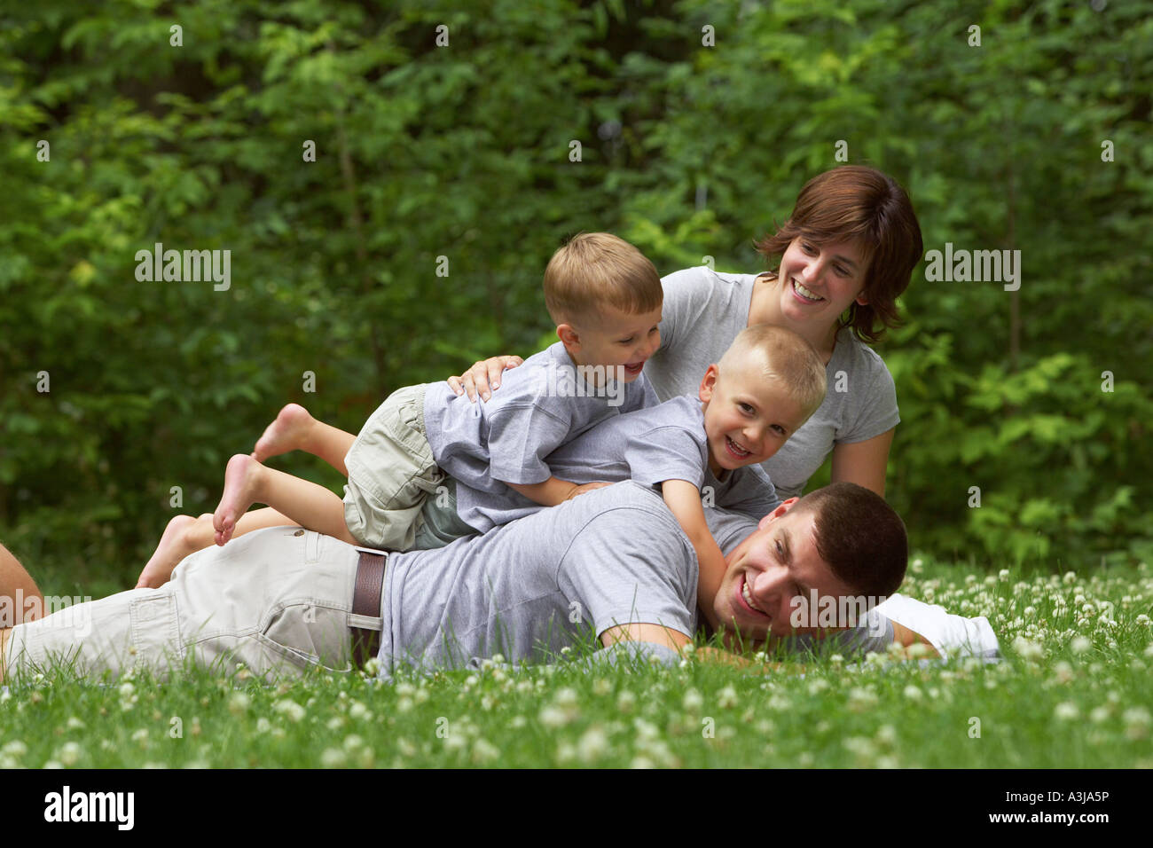Family Playing Outdoors Stock Photo - Alamy