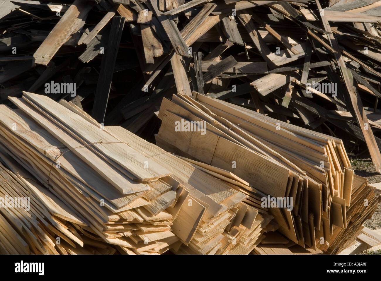 Stacked wood planks in lumberyard Stock Photo - Alamy