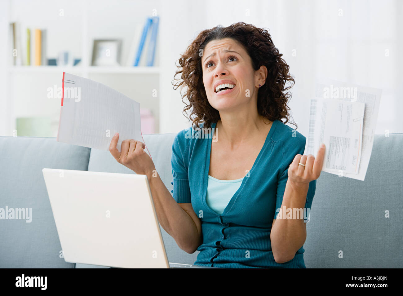 Woman looking at bank statement hi-res stock photography and images - Alamy