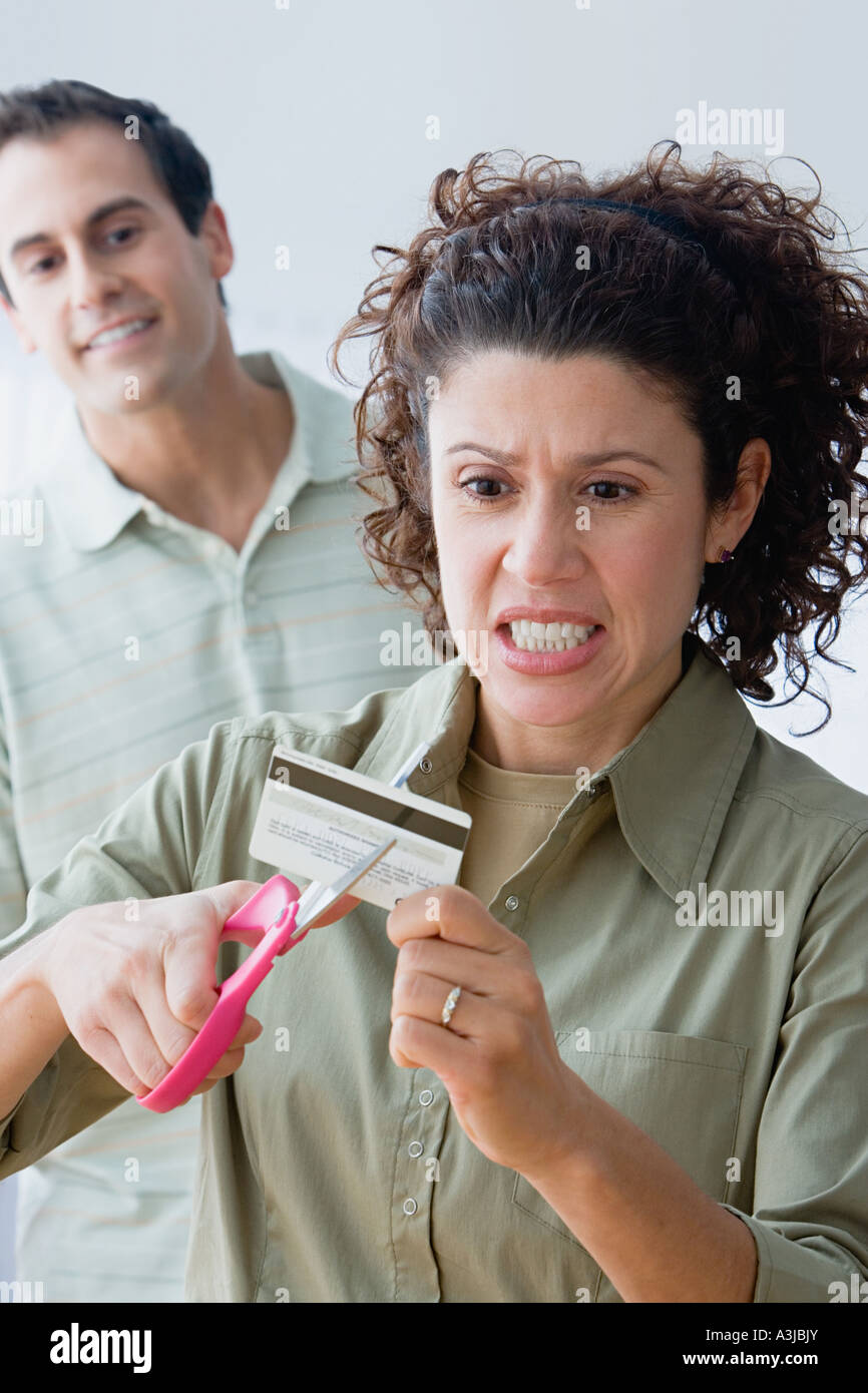 Cutting up money hi-res stock photography and images - Alamy