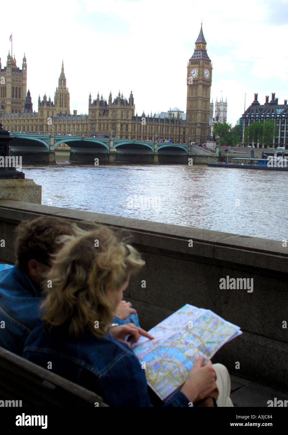 tourist checking London map in front of Big Ben Stock Photo - Alamy