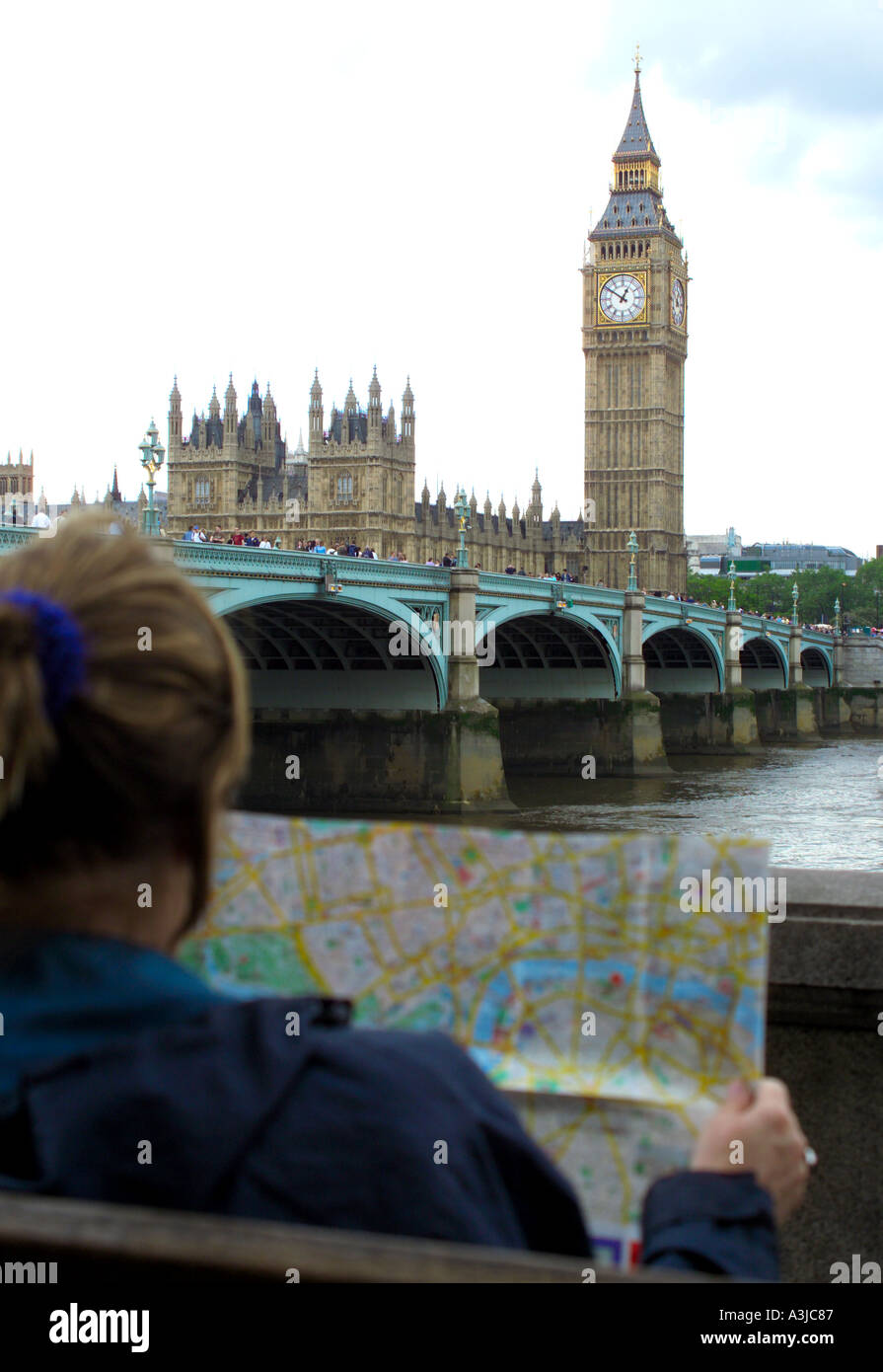 tourist checking London map in front of Big Ben Stock Photo - Alamy