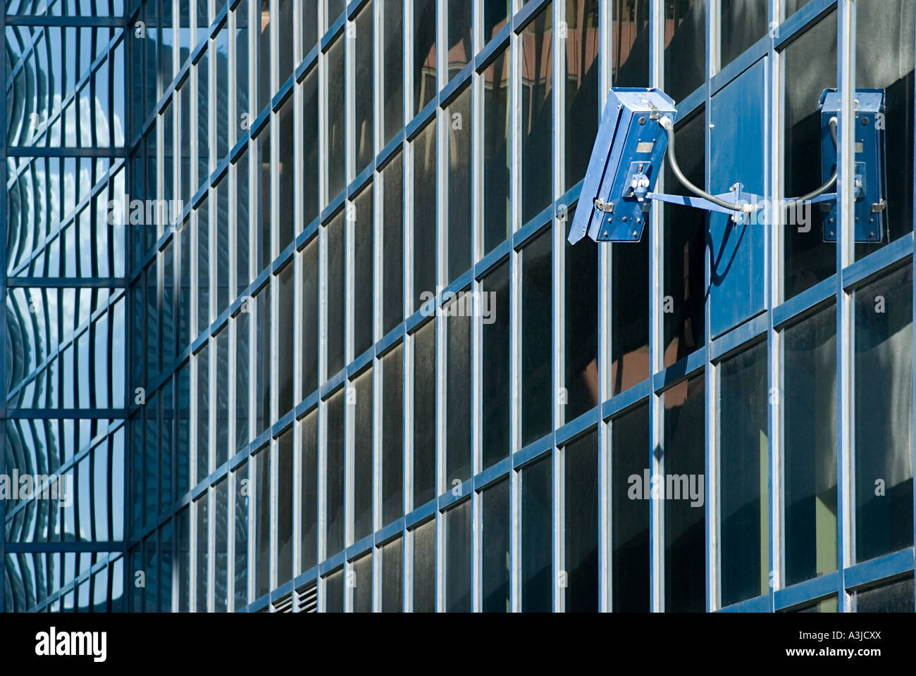 Surveillance camera on building Stock Photo - Alamy
