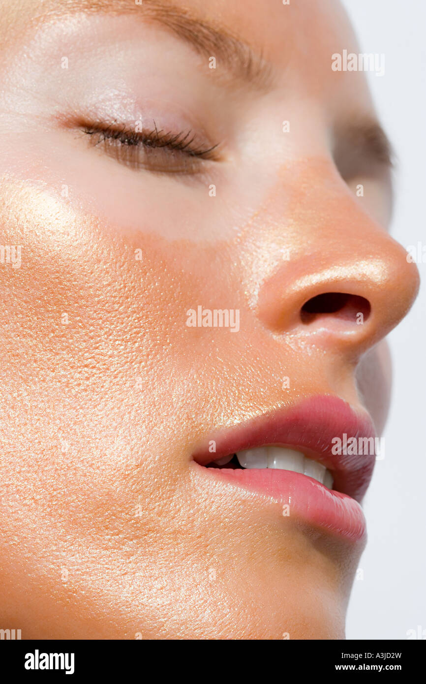 Woman with sunburnt face Stock Photo - Alamy