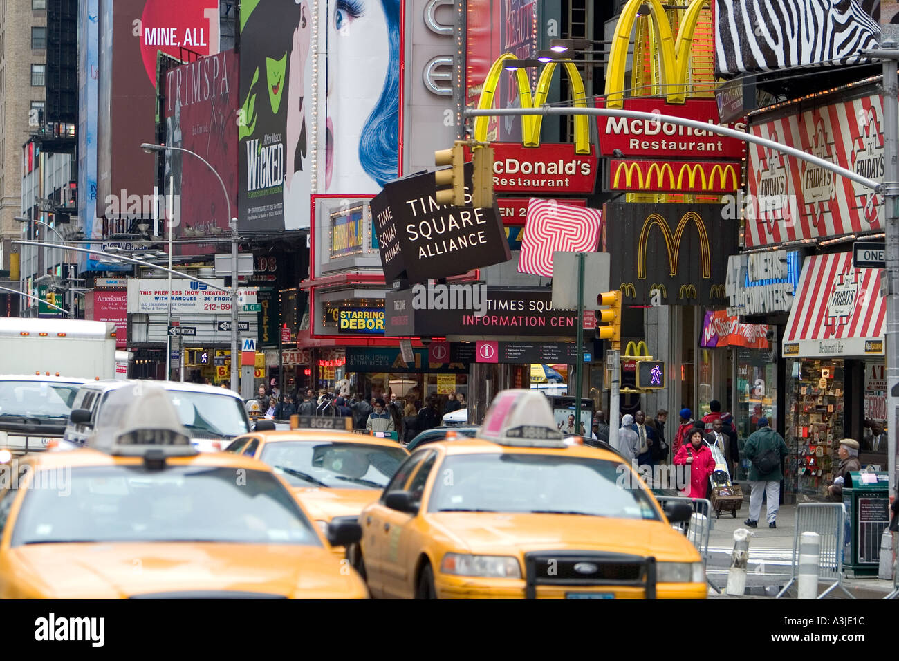 Times Square New York with Yellow Cabs and neon advertising signs Stock ...