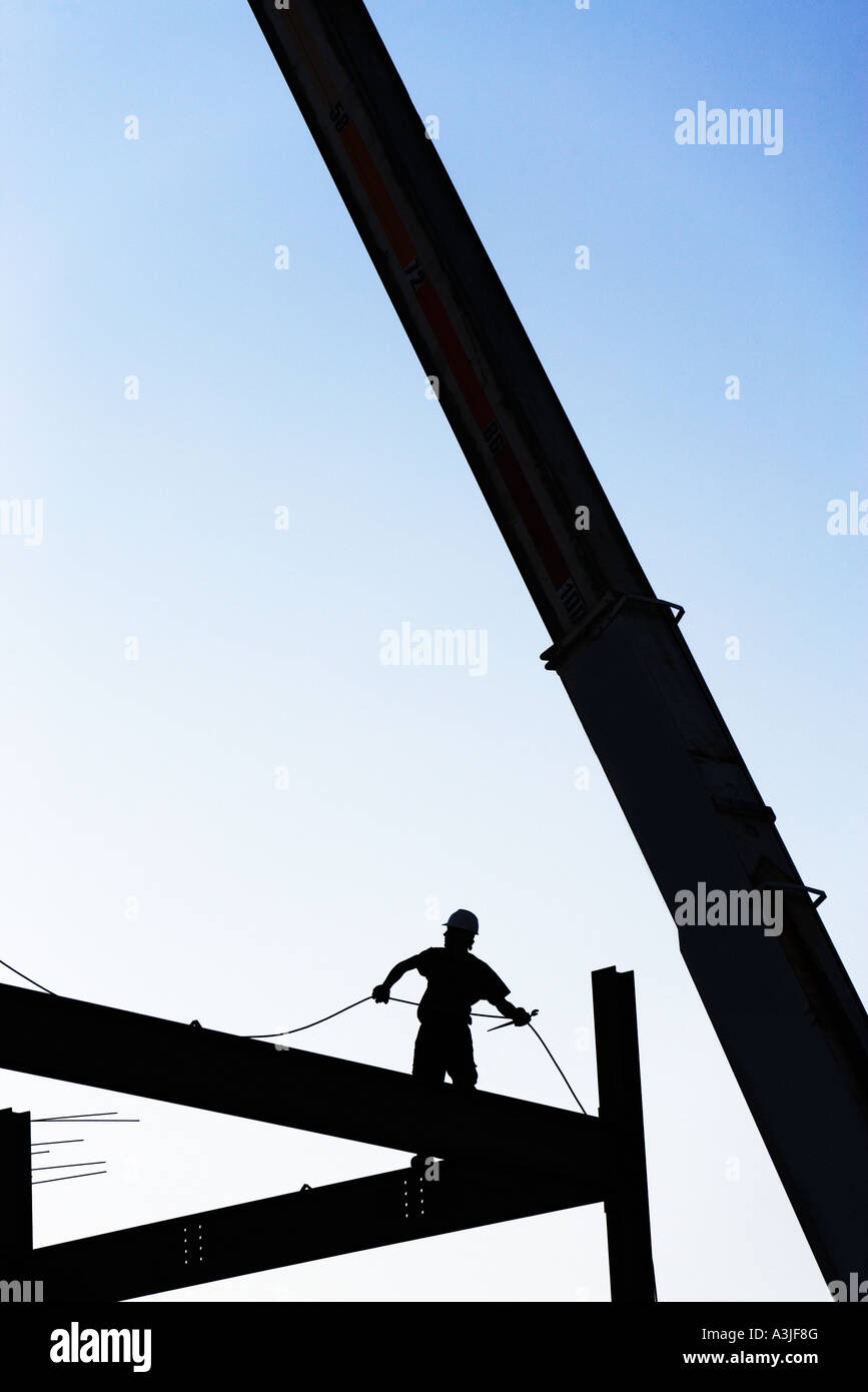 Construction worker on framework Stock Photo - Alamy