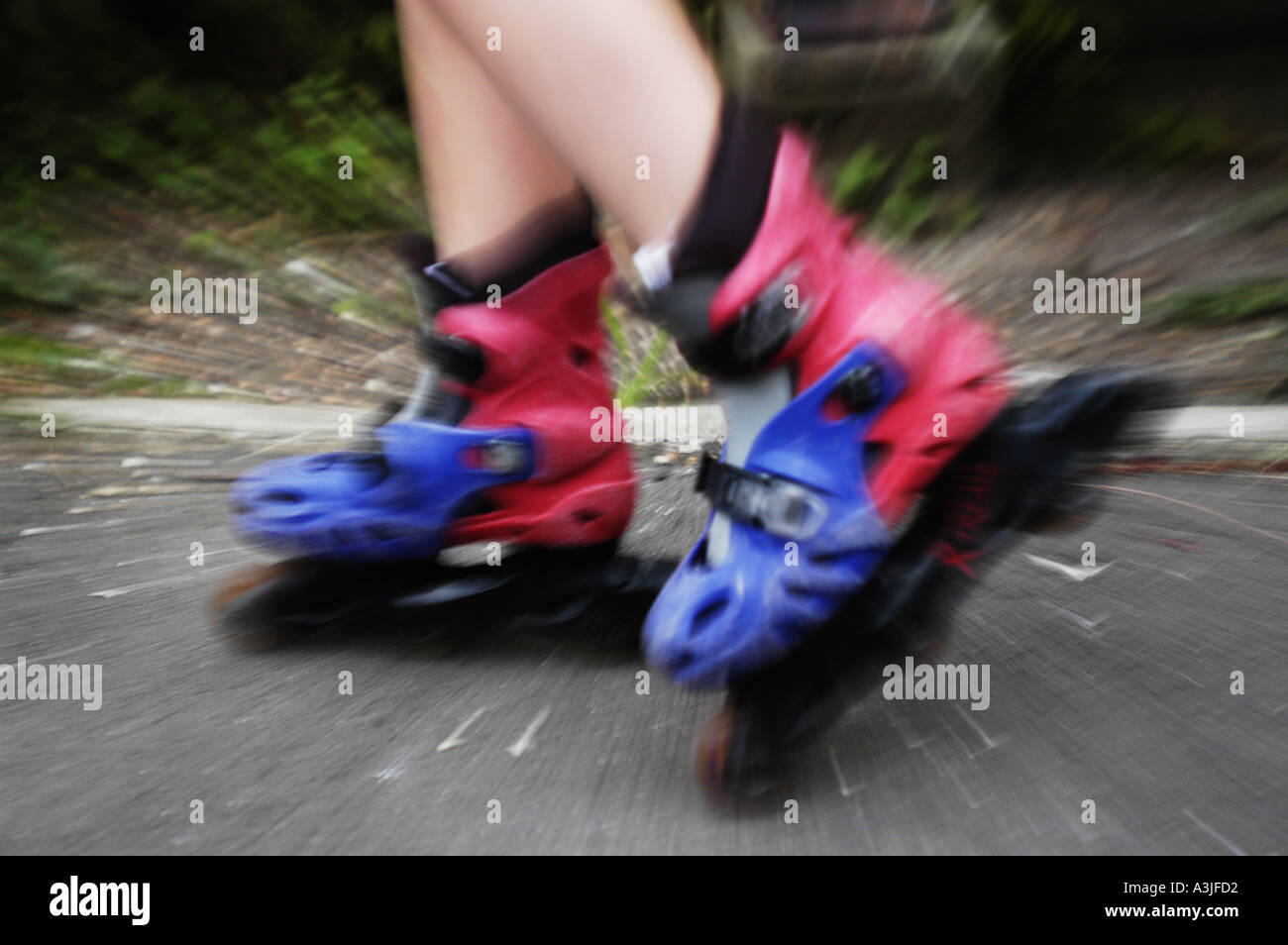 Young girl s feet in a pair of rollerblades Stock Photo - Alamy
