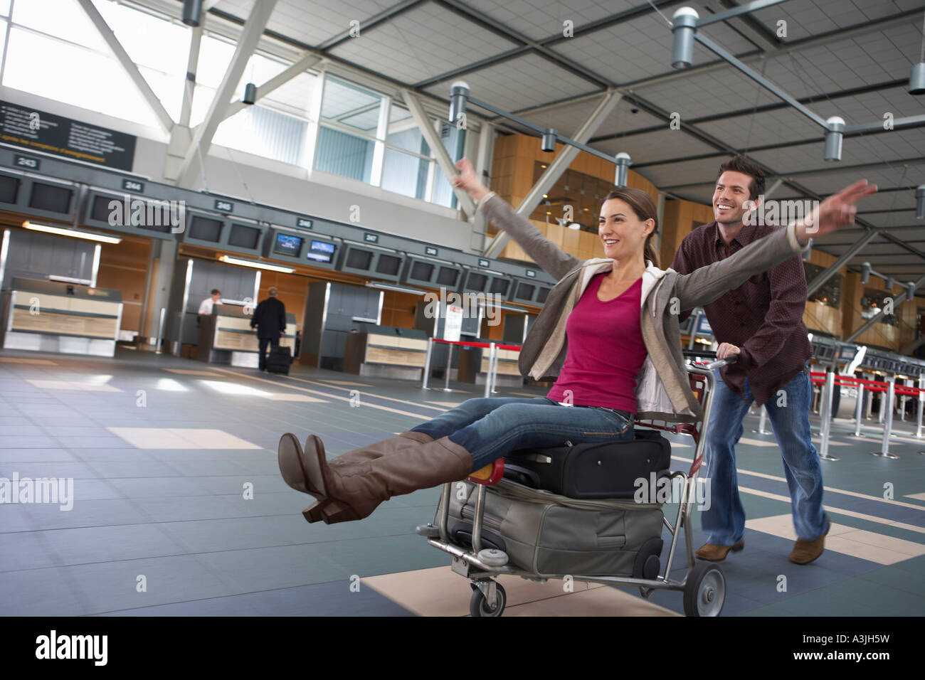 Old lady pulling trolley hi-res stock photography and images - Alamy