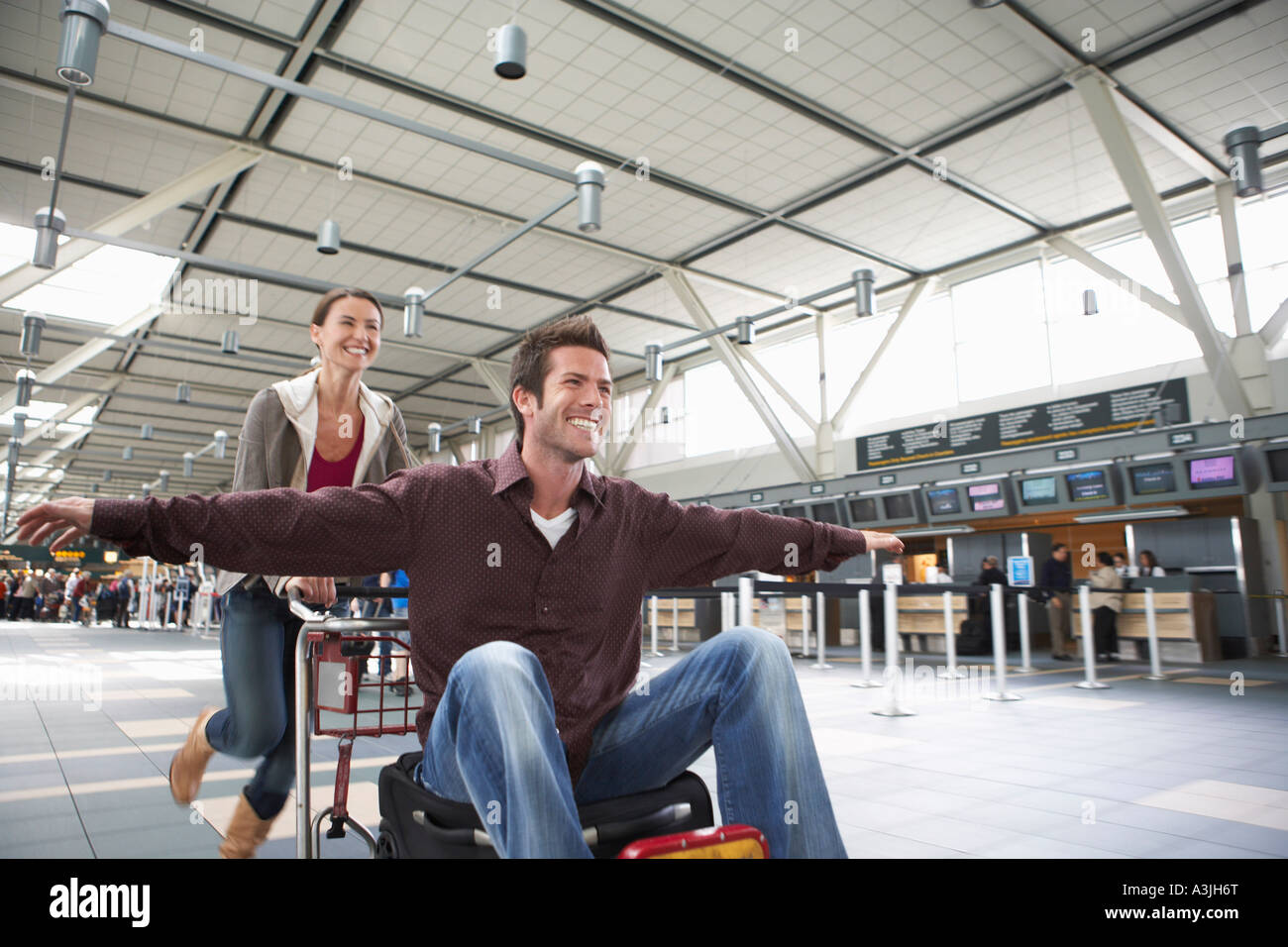 Old lady pulling trolley hi-res stock photography and images - Alamy