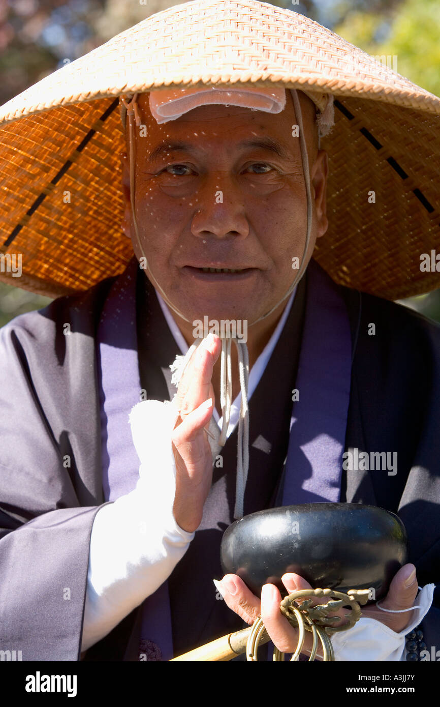 Shinto monk with begging bowl, Japan Stock Photo - Alamy