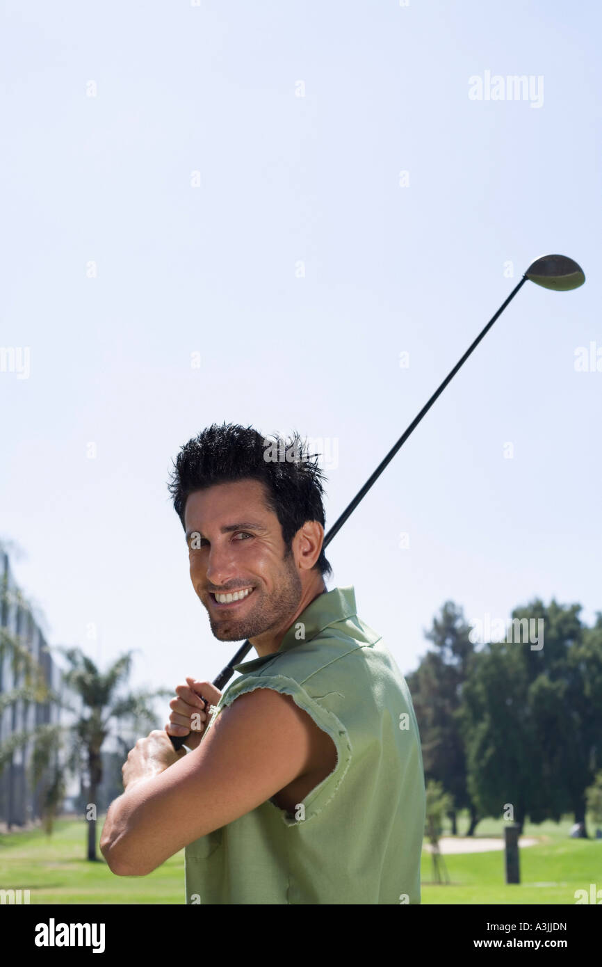 Portrait of Golfer with Golf Club Stock Photo - Alamy