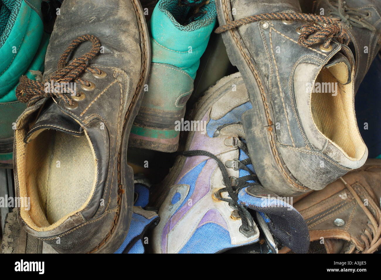 Some worn out shoes Stock Photo - Alamy