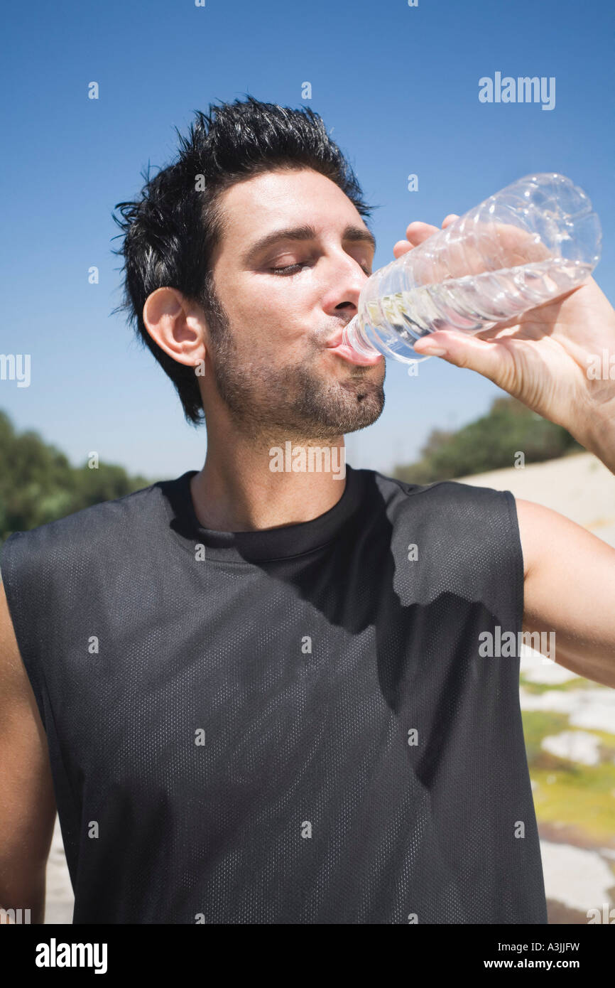 Man Drinking Bottled Water Stock Photo - Alamy