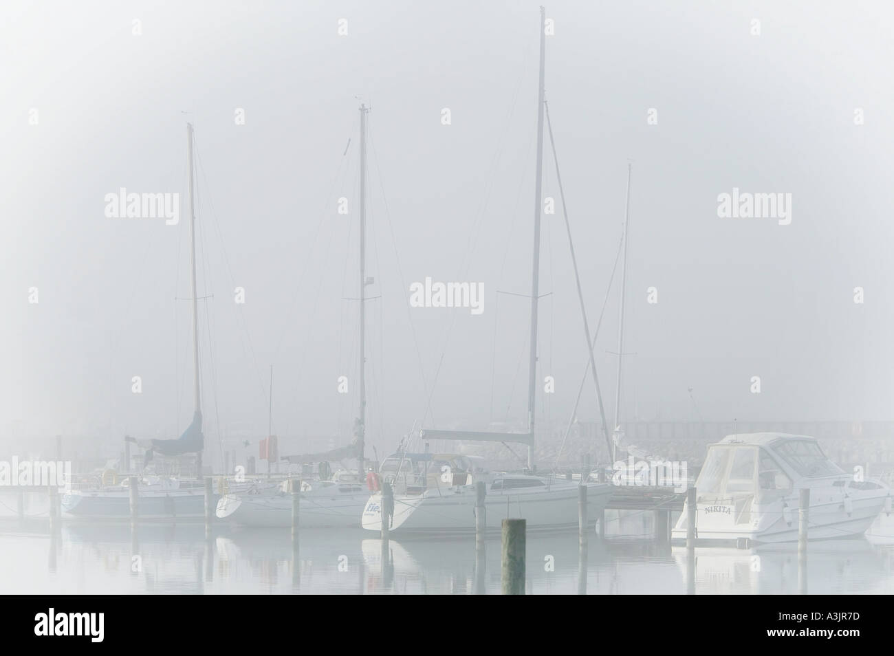 Yachting harbor in haze Stock Photo - Alamy