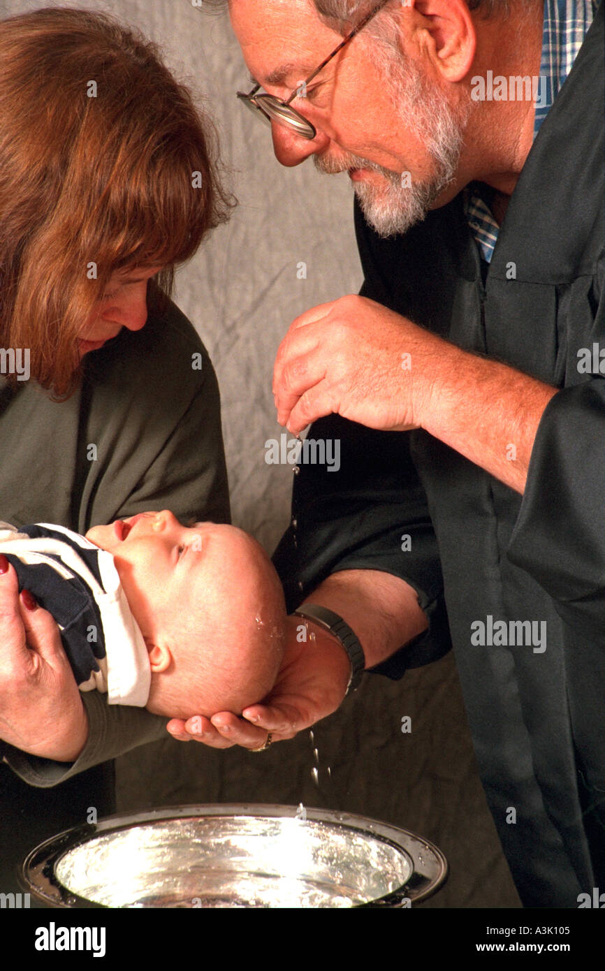 Pastor baptizing male hi-res stock photography and images - Alamy