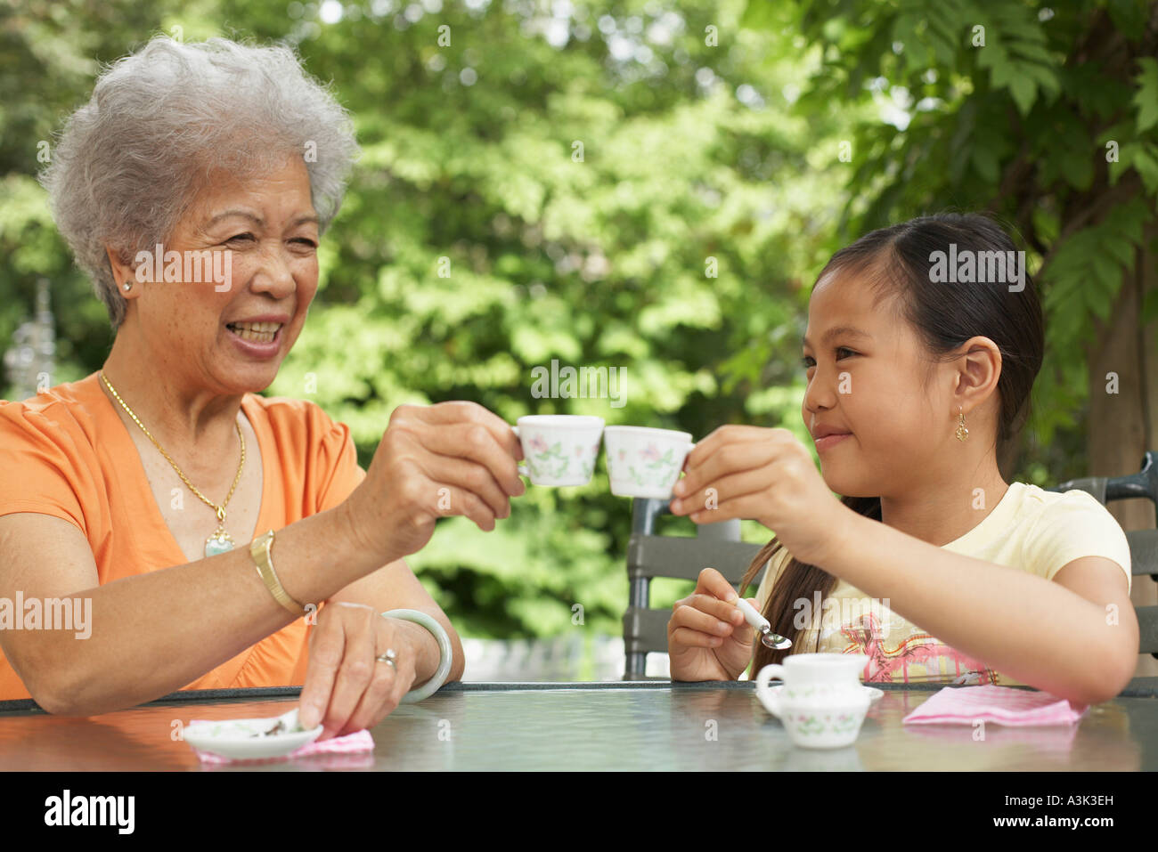 Two children having tea party hi-res stock photography and images - Alamy