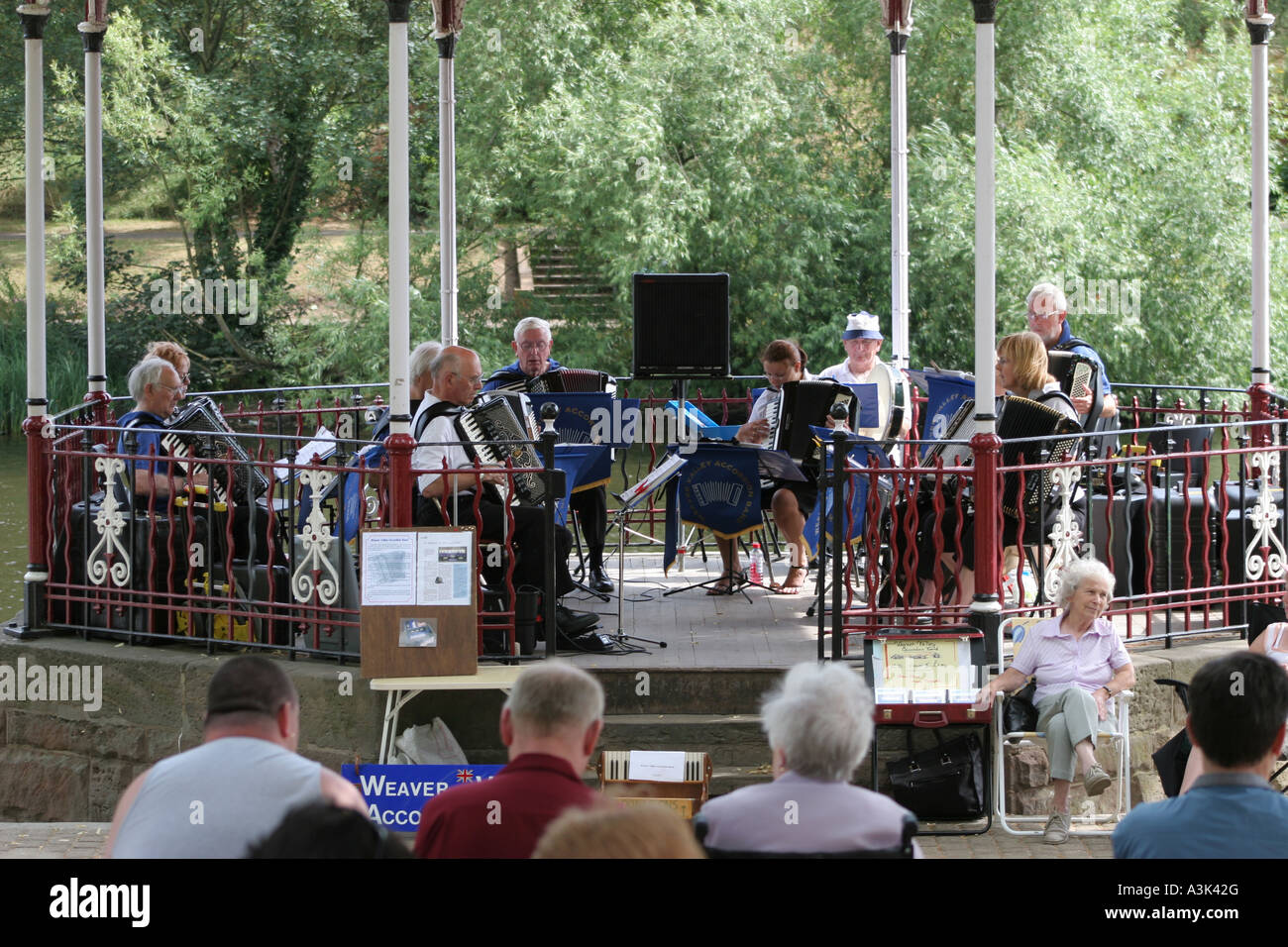 Weaver Valley Accordion Band perform in the bandstand at Chester beside ...