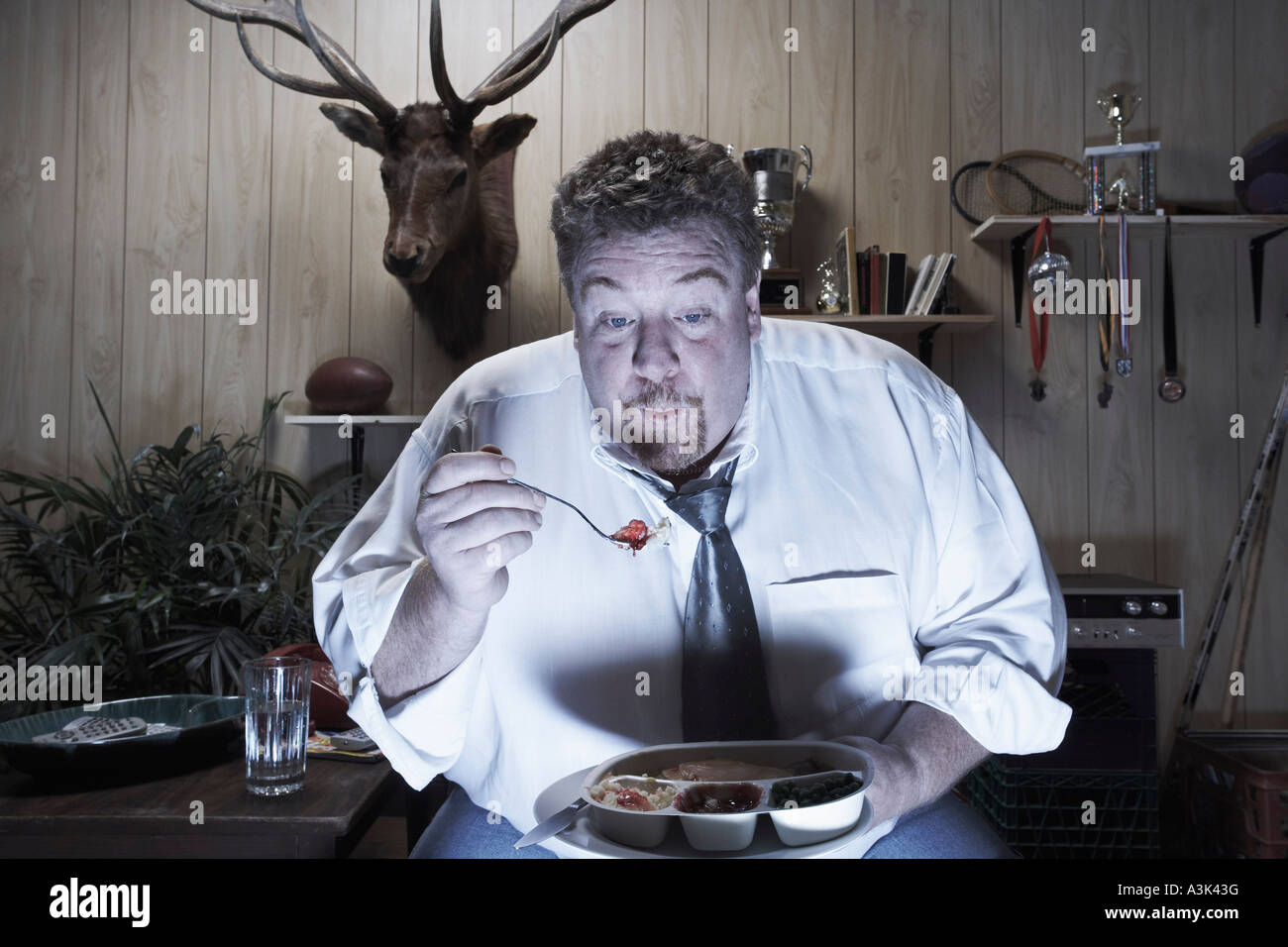 Obesity man watch tv hi-res stock photography and images - Alamy