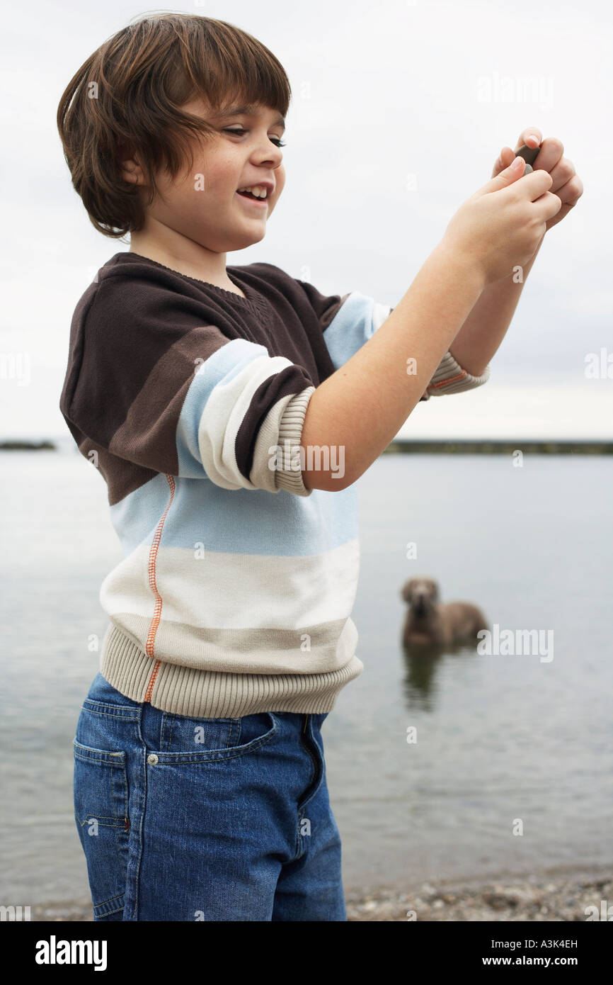 Little Boy With Rock High Resolution Stock Photography and Images - Alamy