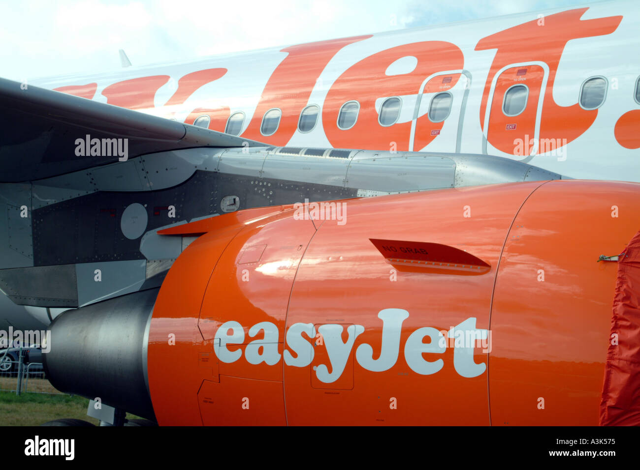 easyJet logo on engine of Airbus A319 twinjet aircraft Stock Photo - Alamy