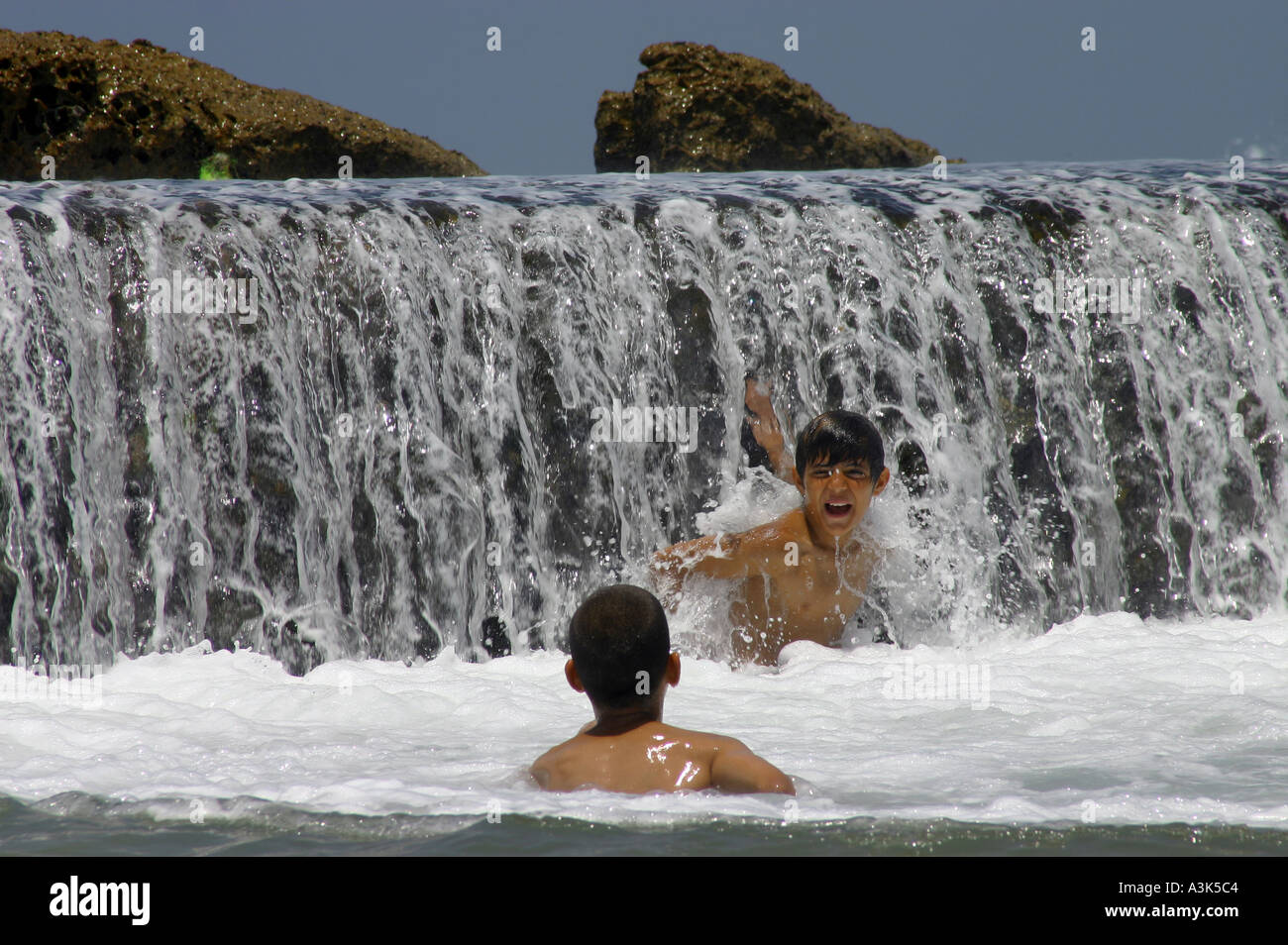 tsunami children people weather disaster water ocean Stock Photo - Alamy