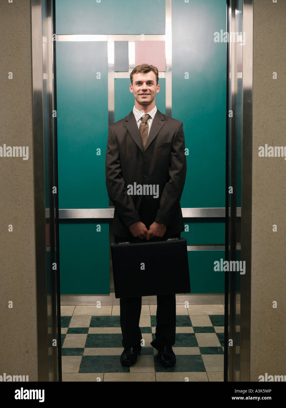 Man stand in an elevator hi-res stock photography and images - Alamy