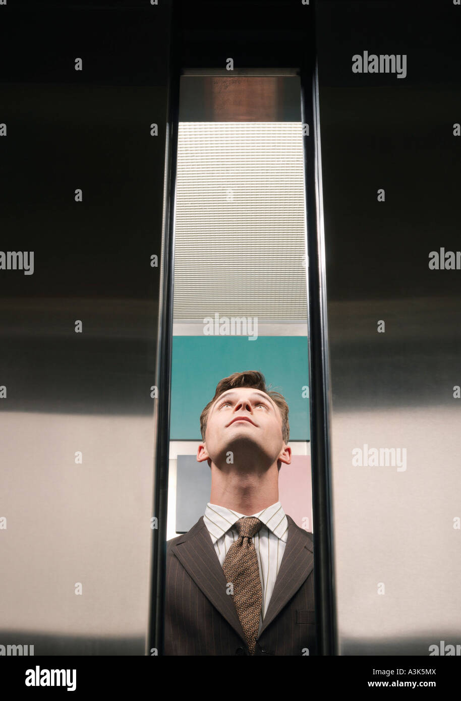 Elevator Man Looking Up High Resolution Stock Photography and Images ...