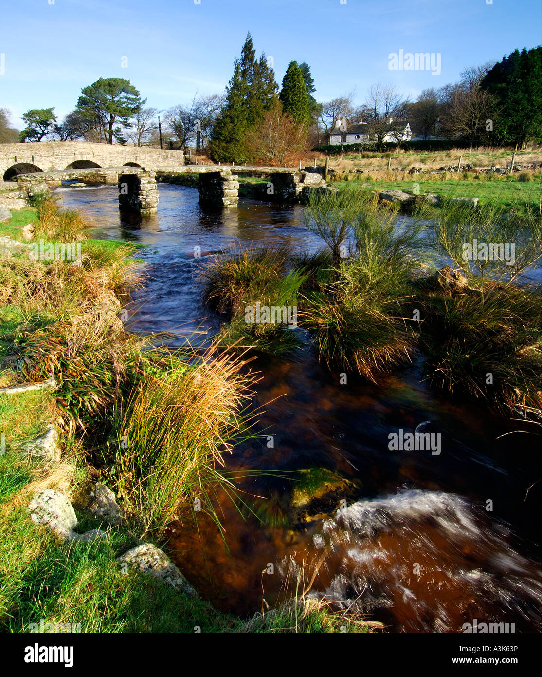 Village of Postbridge Dartmoor showing both the newer stone road bridge ...