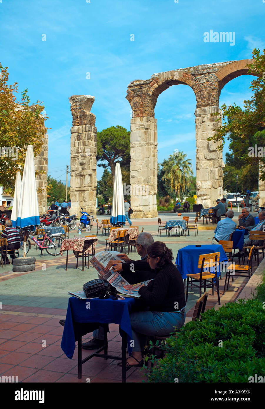 Cafes by the aqueduct on Cengiz Topel Caddesi Stock Photo - Alamy