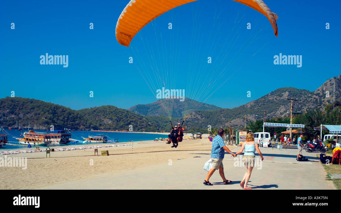 Paragliders landing on the beach at Oludeniz Stock Photo - Alamy