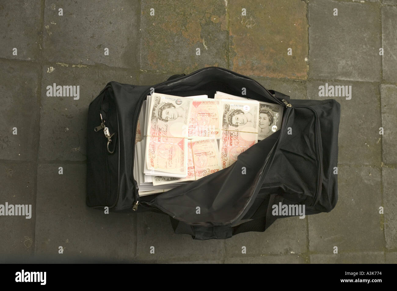 black bag of banknotes Stock Photo - Alamy