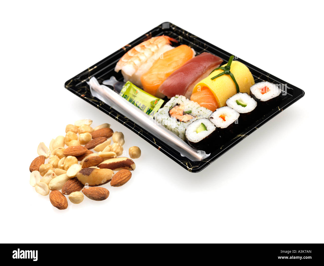 Healthy Japanese Style Sushi Meal With A Handful Of Mixed Nuts Isolated ...