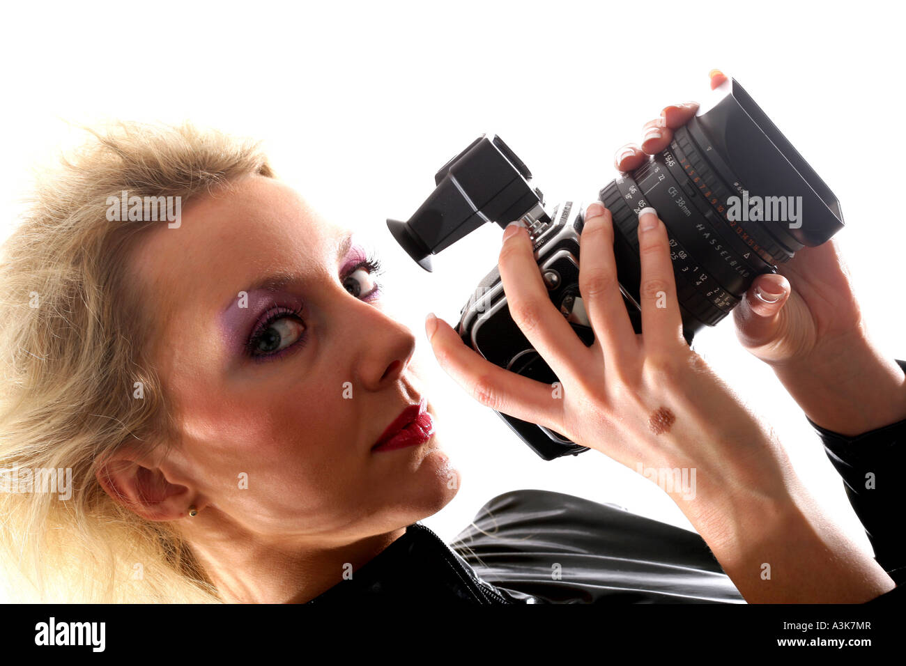 Young Creative Female Photographer Using A Retro Medium Format ...