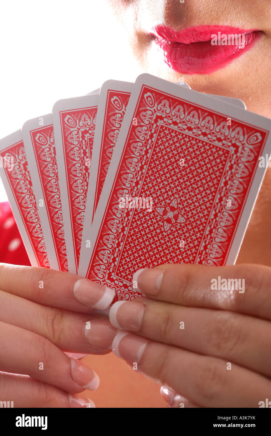 Young Woman Holding Playing Cards Model Released Stock Photo - Alamy