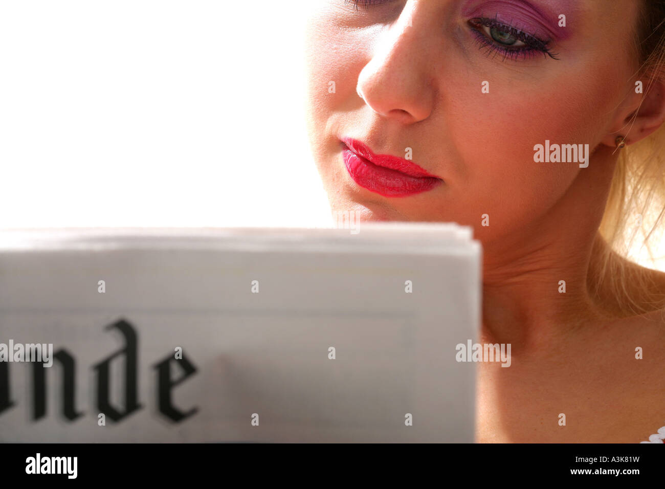 Young Woman Reading Newspaper Model Released Stock Photo - Alamy