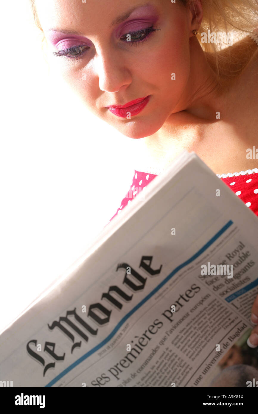 Young Woman French Reading Newspaper Model Released Stock Photo - Alamy