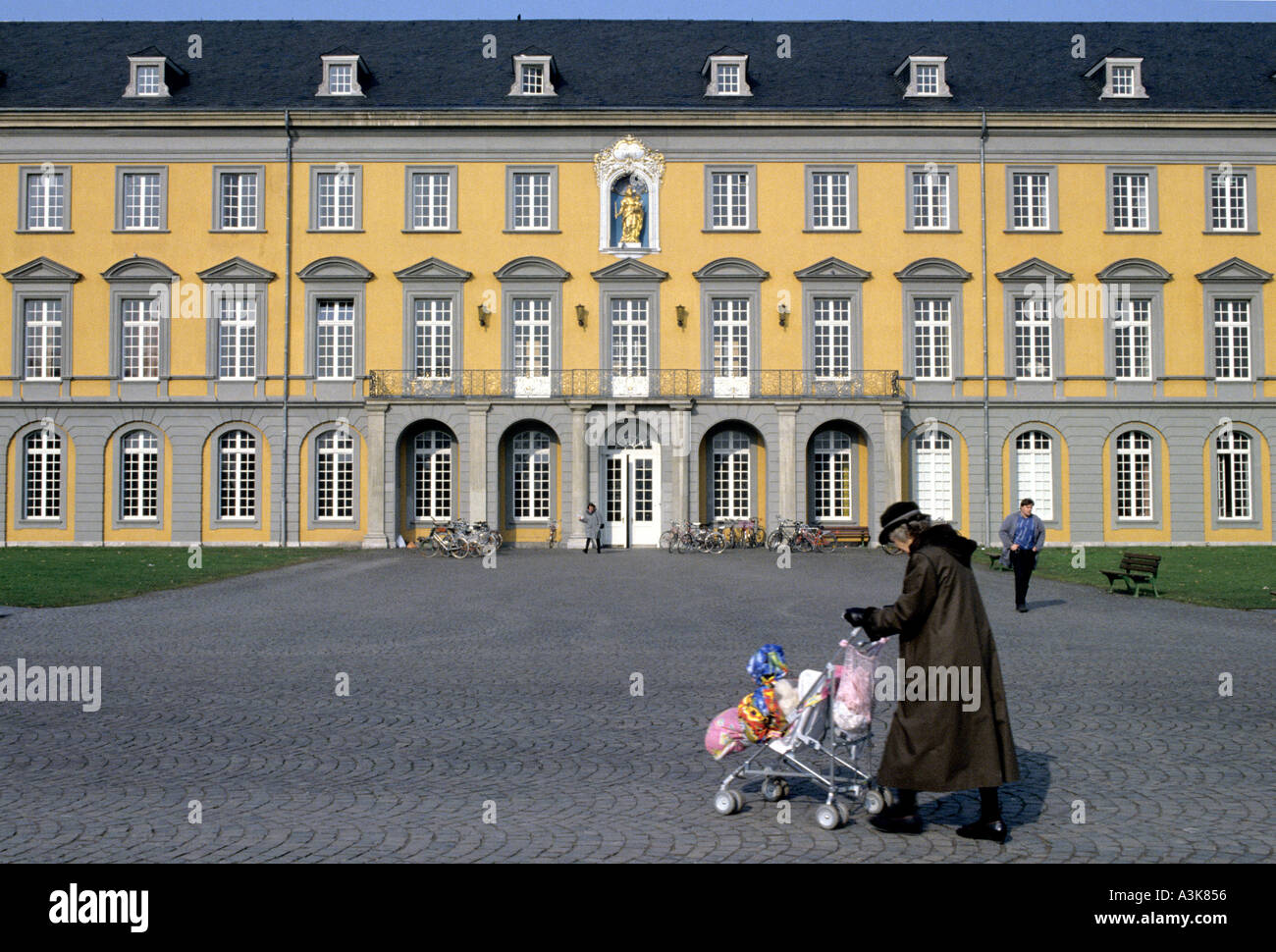 Woman pushing baby stroller bonn hi-res stock photography and images ...