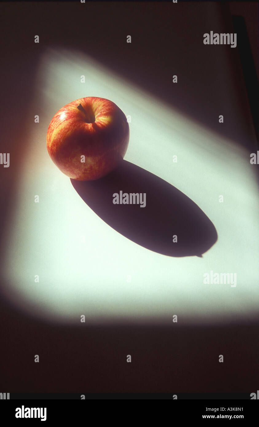 Apple sitting on kitchen counter Stock Photo - Alamy