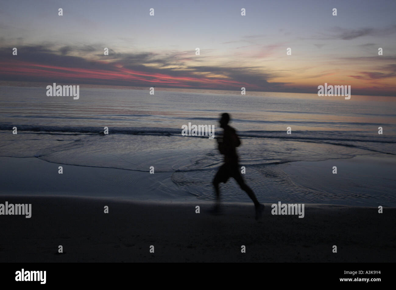 Man running Santa Catalina Beach Sherry Port Puerto de Santa Maria ...