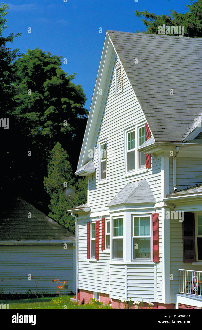 Detail of a neat and tidy version of the standard clapboard house on ...
